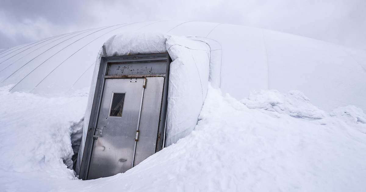 Inflatable dome over Edor Nelson Field in snow